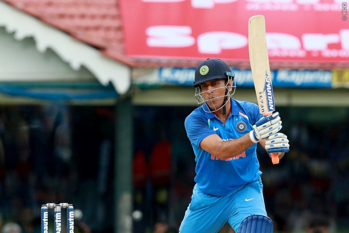 VIDEO | MS Dhoni wields his bat in the middle of the pitch to signal ...
